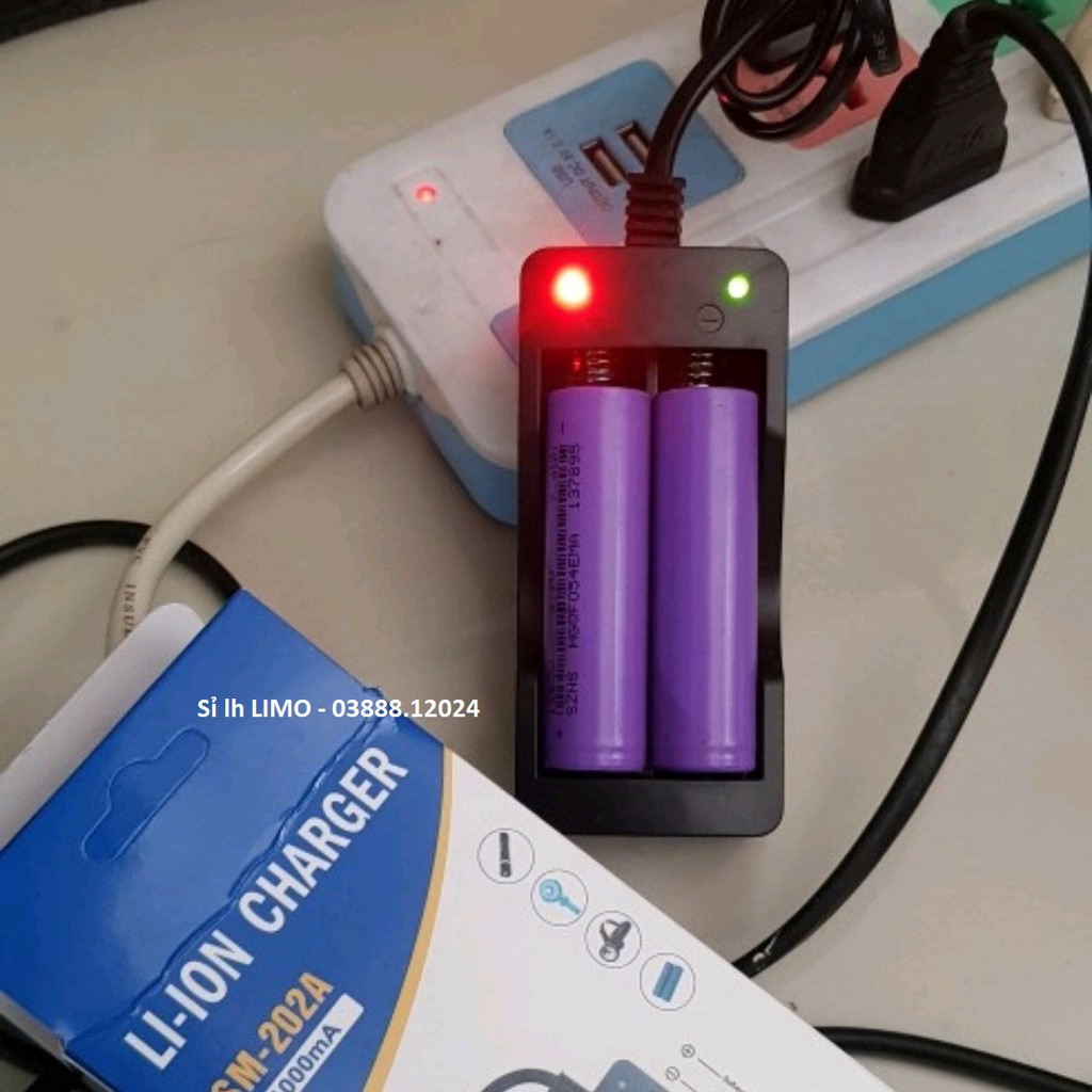 Máy sạc pin đa năng 1 cell / 2 cell pin 18650 SM-202A. Có đèn báo đầy pin. Dòng sạc 1000ma ...