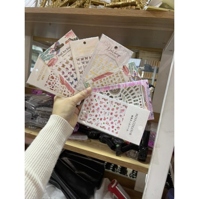 sticker các kiểu các loại hang trăm mẫu , bướm , noen, thương hiệu , bò ...