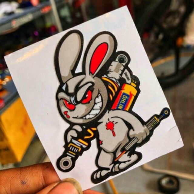 Tem sticker thỏ điên cầm phuộc OH cao 8cm x6.5 cm dán xe, điện thoại ...