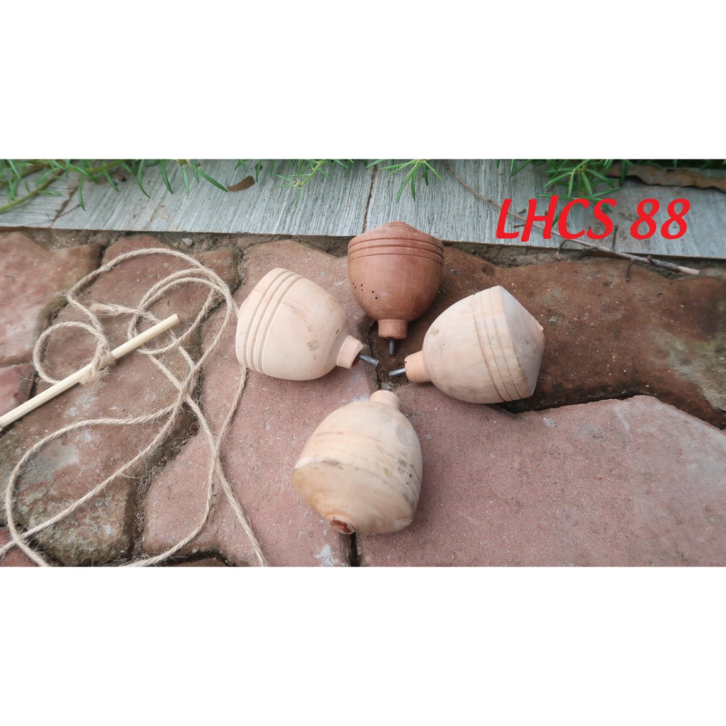 con cù, con quay, bông vụ ngày xưa ( kèm dây) | Shopee Việt Nam