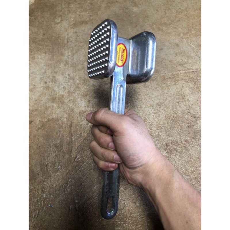 Búa đập thịt hai mặt gai và trơn búa dần thịt loại nặng cầm đầm tay ...