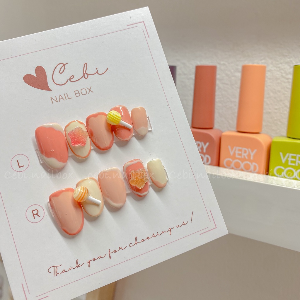 Móng úp thiết kế màu cam kẹo mút c147 form ngắn đi học đi chơi cebi ...