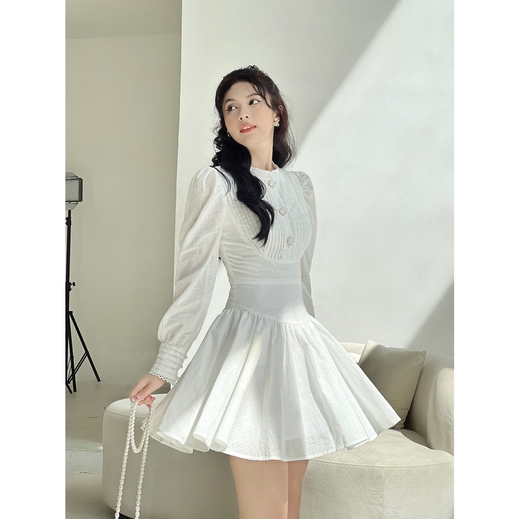 Váy trắng tay phồng xếp li cổ điển SOFIA DRESS - COQUI | Shopee Việt Nam