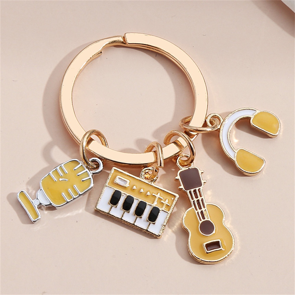 Móc Khóa Kim Loại Hình Nốt Nhạc violin Ghi Chú Ngôi Sao | Shopee Việt Nam