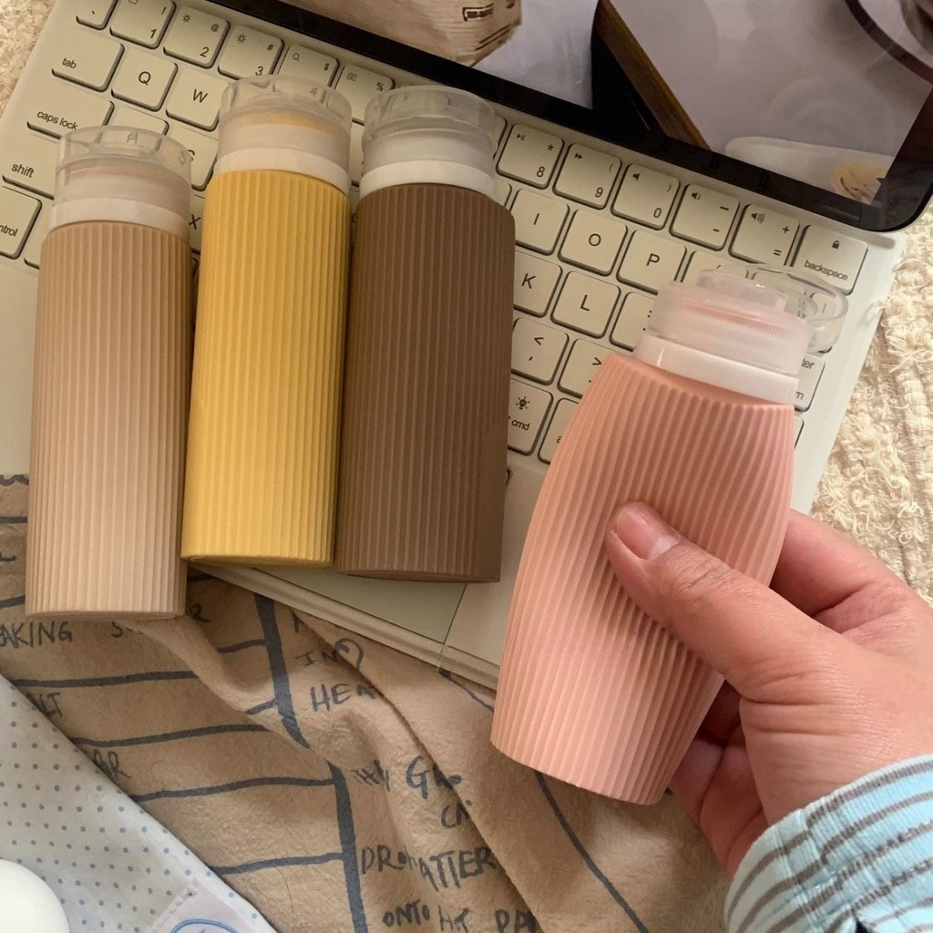 Du lịch lưu trữ chai 100ml Silicone Dispenser chai rỗng dầu gội mỹ phẩm ...