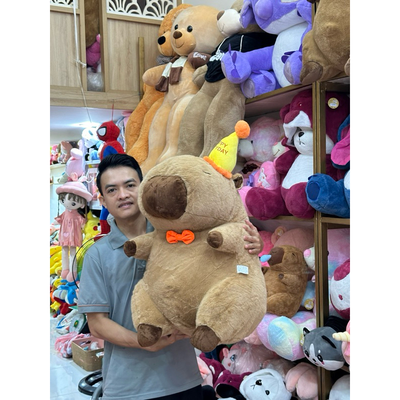 Gấu bông capybara, capybara màu hồng, capybara đeo túi, capybara nước ...