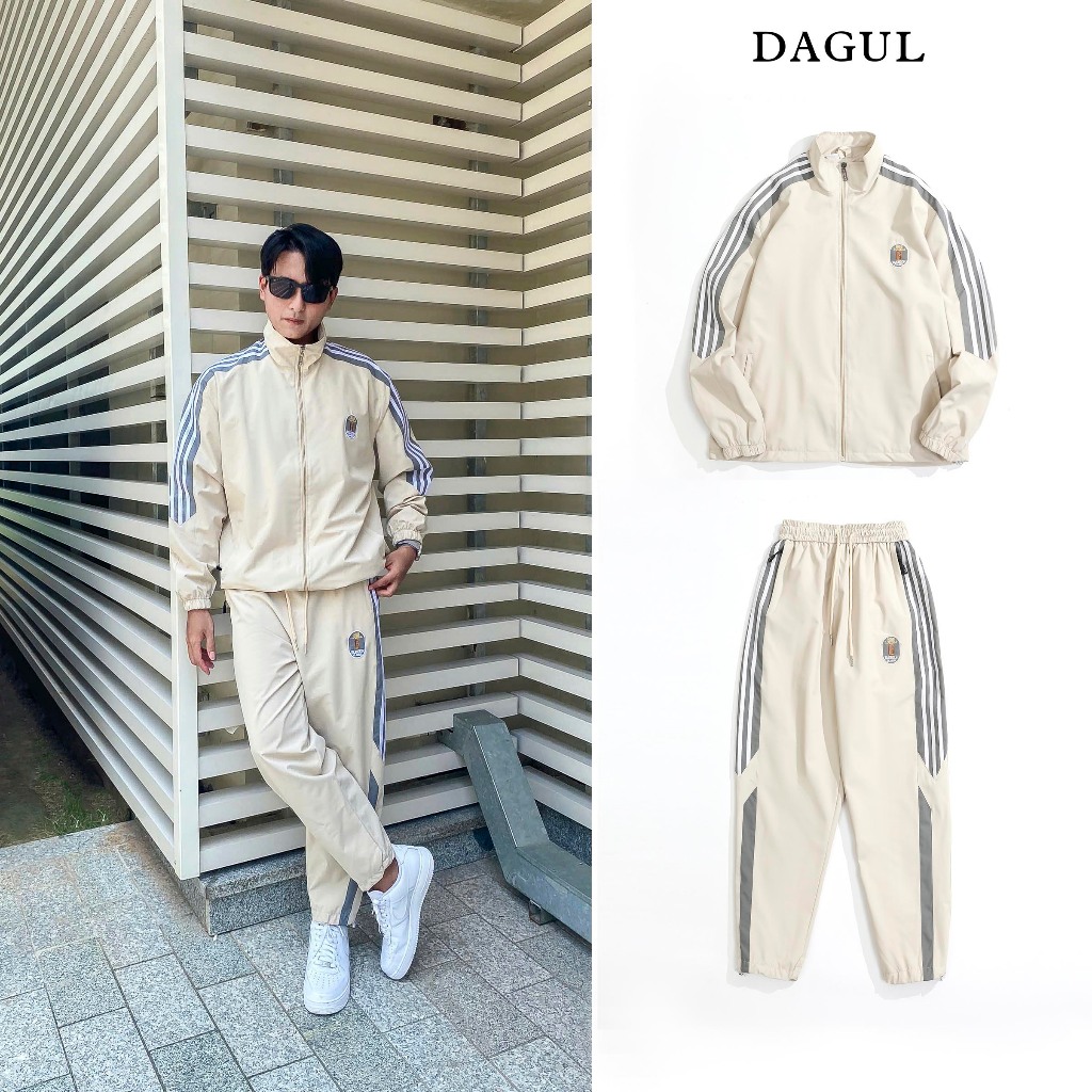Bộ gió DAGUL nam nữ phối viền, lót lưới, logo thêu, túi quần và túi áo ...