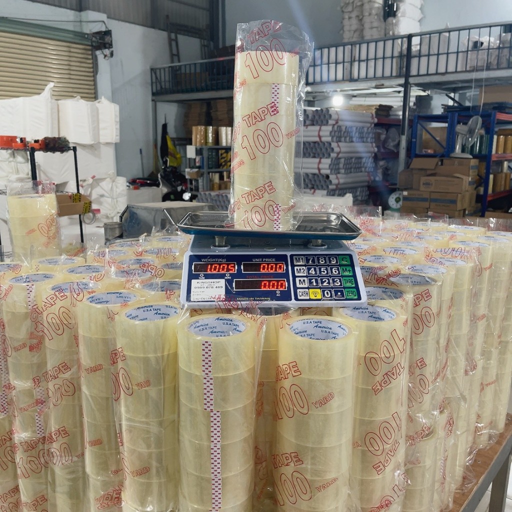 Băng keo 100 yard 1kg trong, vàng đục lõi mỏng 5li 1 cây gồm 6 cuộn ...