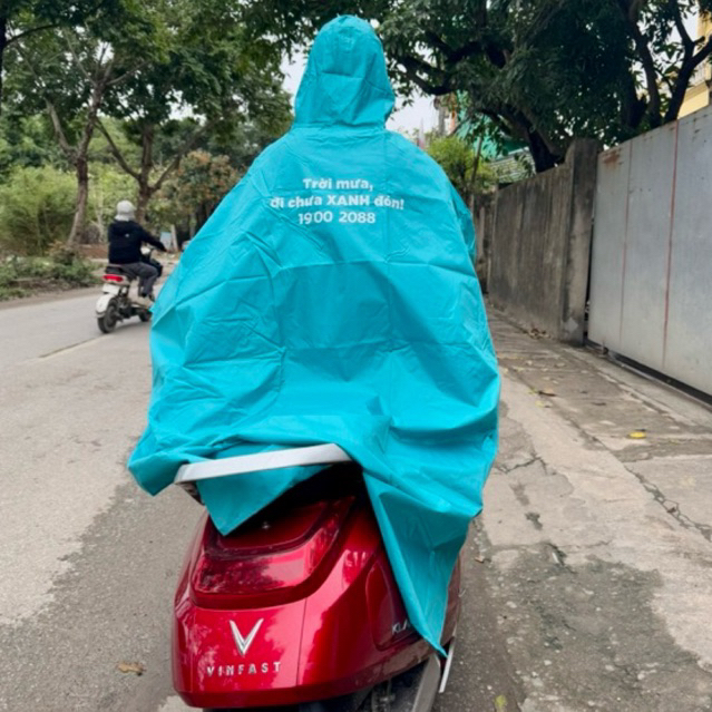 Áo mưa Xanh SM chuẩn hãng, màu xanh dương nhạt, logo XanhSM. XanhSM ...