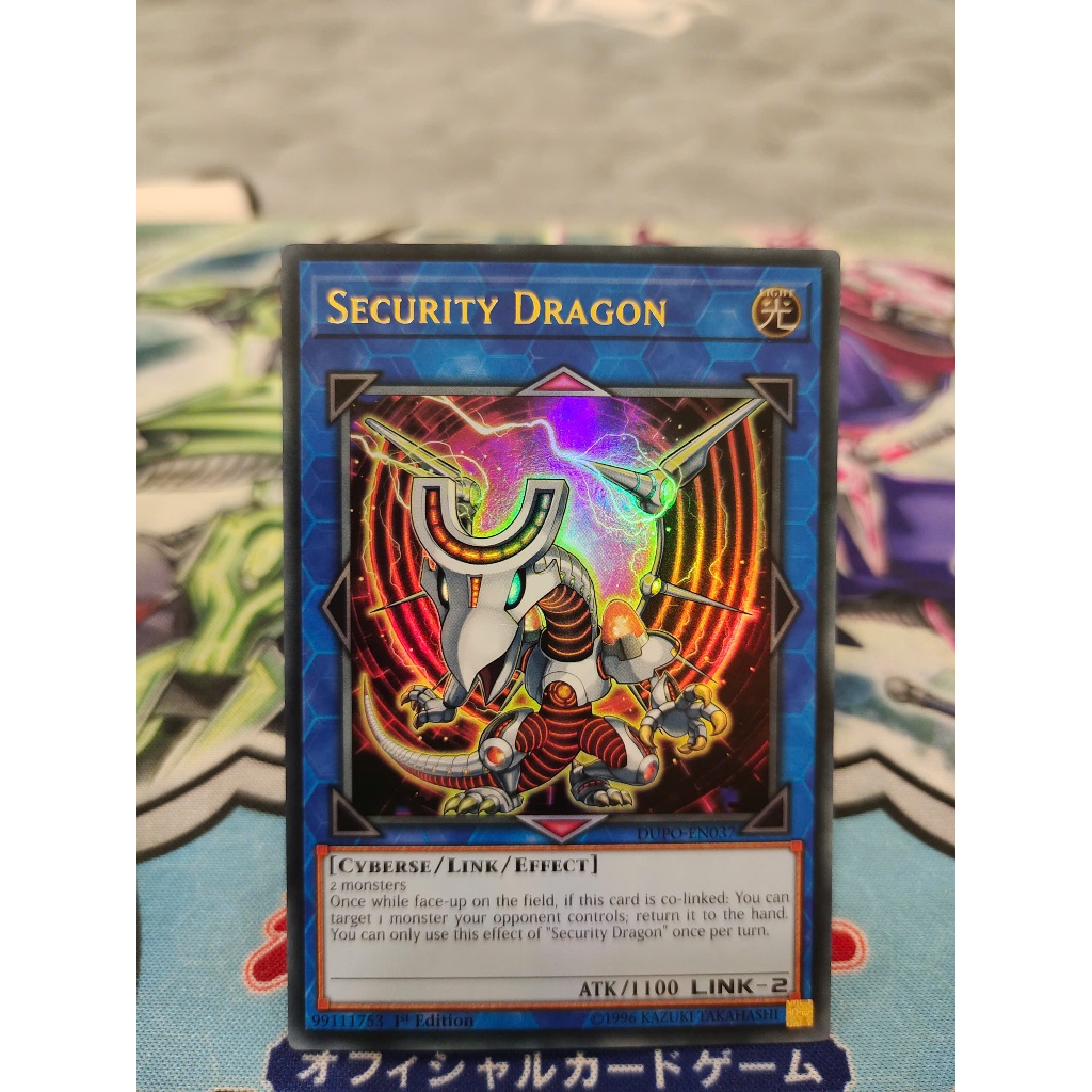 Thẻ bài Yugioh chính hãng Security Dragon - DUPO-EN037 - Ultra Rare 1st Edition | Shopee Việt Nam