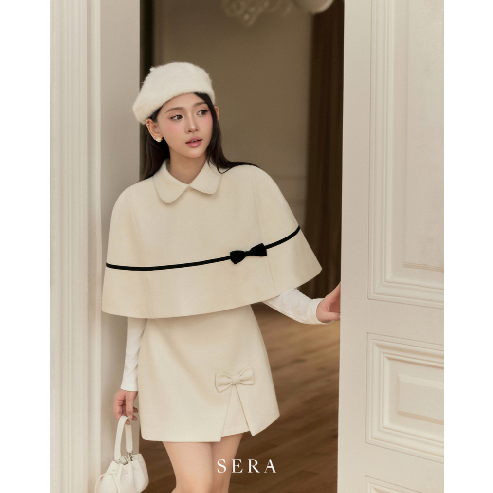 SERA - Set áo choàng và chân váy dạ đính nơ Stella | Shopee Việt Nam