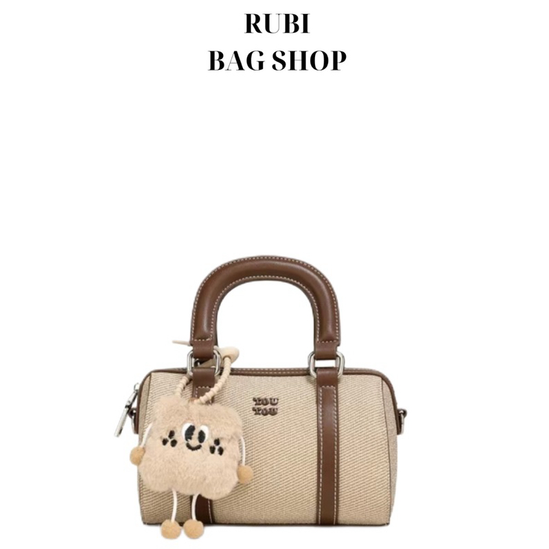 Túi TOU TOU be phối nâu kèm charm bông | Shopee Việt Nam