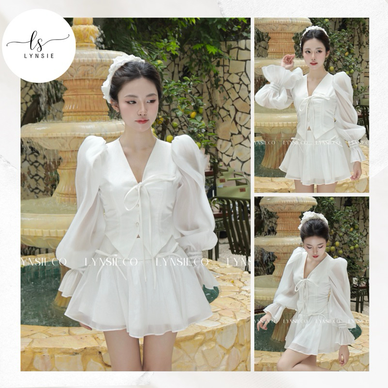 [Jolie set] Set áo tay bồng và chân váy xoè đính nơ chất liệu tafta ...
