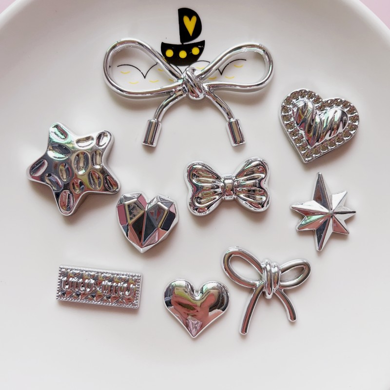 Bộ 9 Sticker, Charm 3D chủ đề Nơ bạc DIY Mayto gắn Dép Sục, Cá Sấu JB ...
