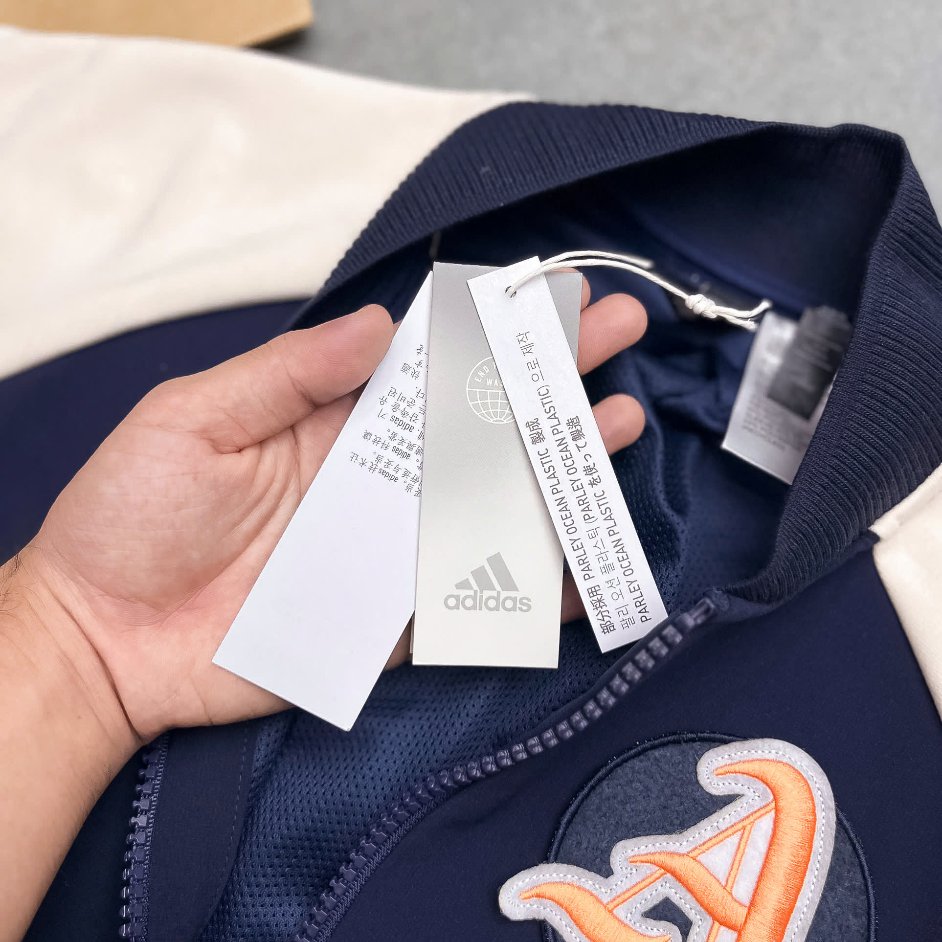 Áo Khoác Bomber Thể Thao Unisex Adidas VRCT Jacket Kem/Navy - DX8408 ...